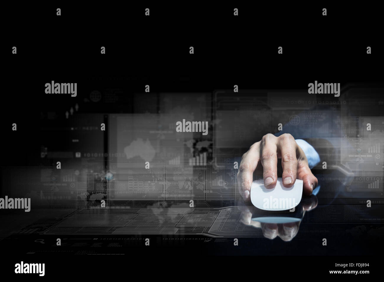Hand of businessman in suit on dark digital background using wireless ...