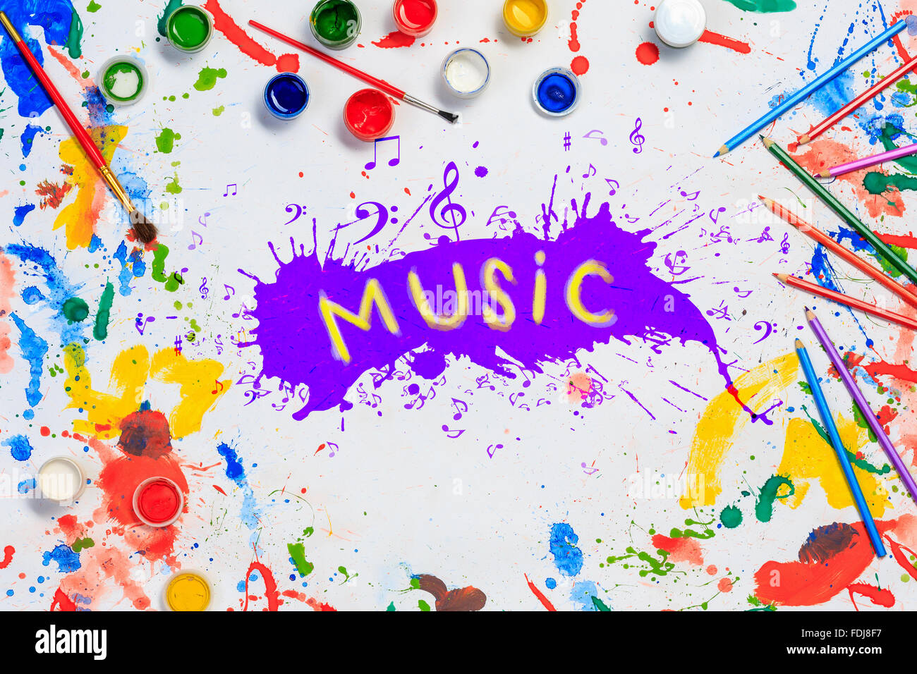 Music concept with paint spalshes on white paper Stock Photo - Alamy