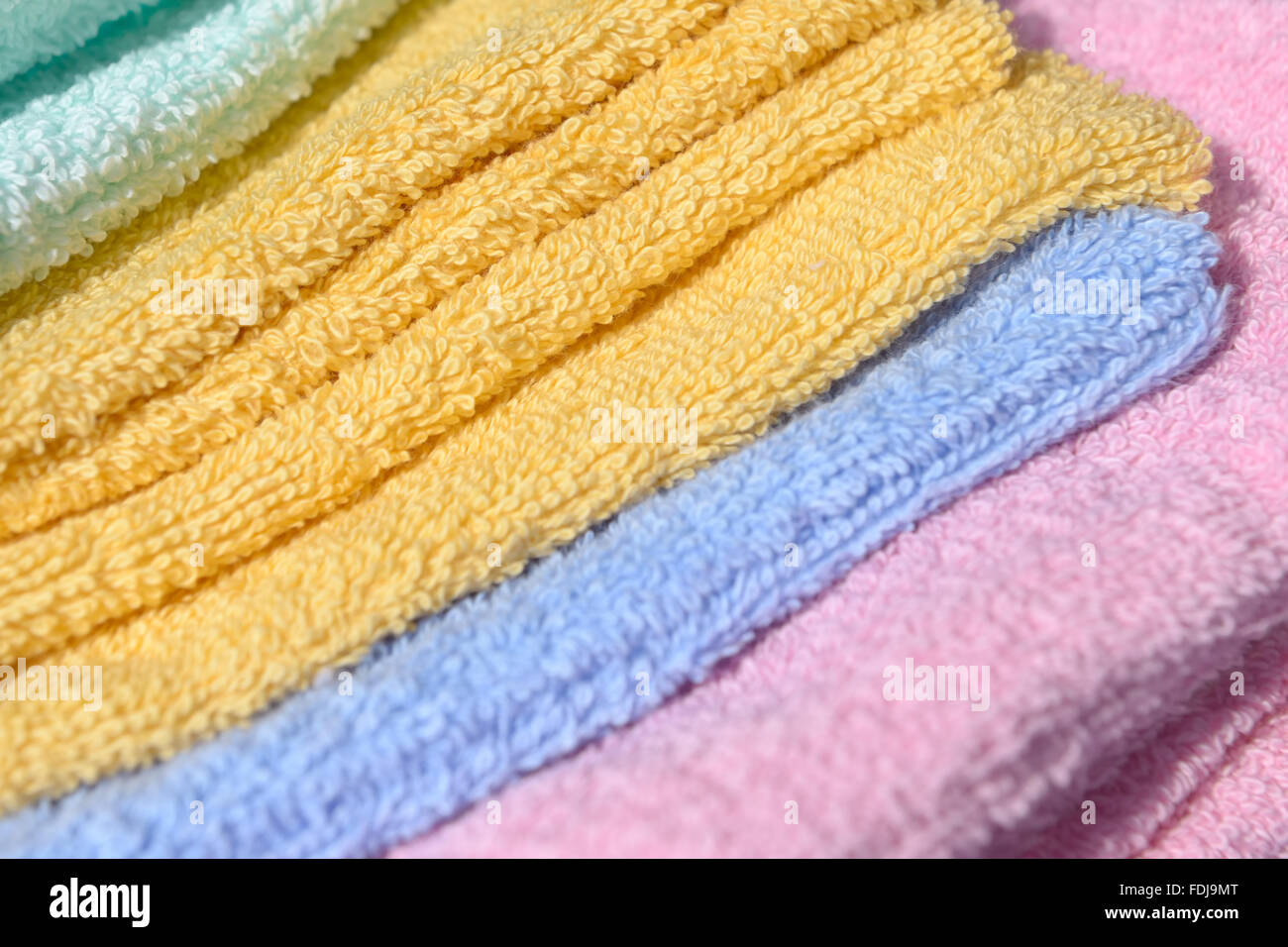 Soft surface of towels of different colors Stock Photo - Alamy