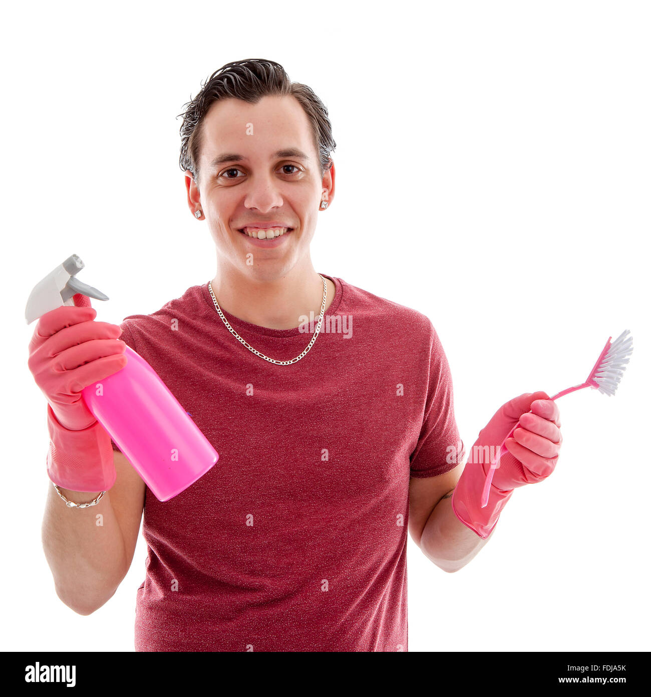 Young man with cleaning supply over white background Stock Photo - Alamy