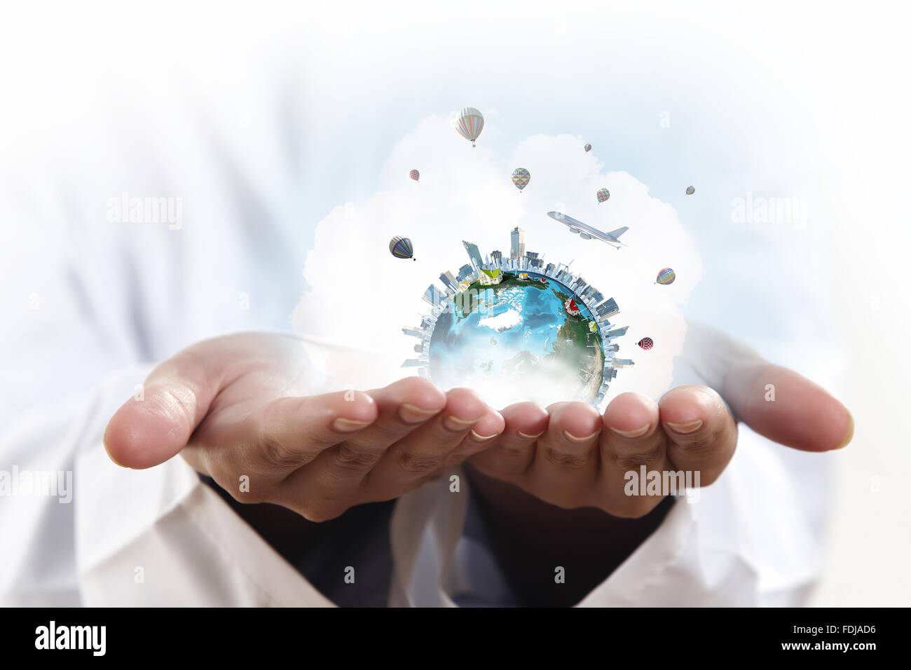 Male hands holding world concept in palms. Elements of this image are ...