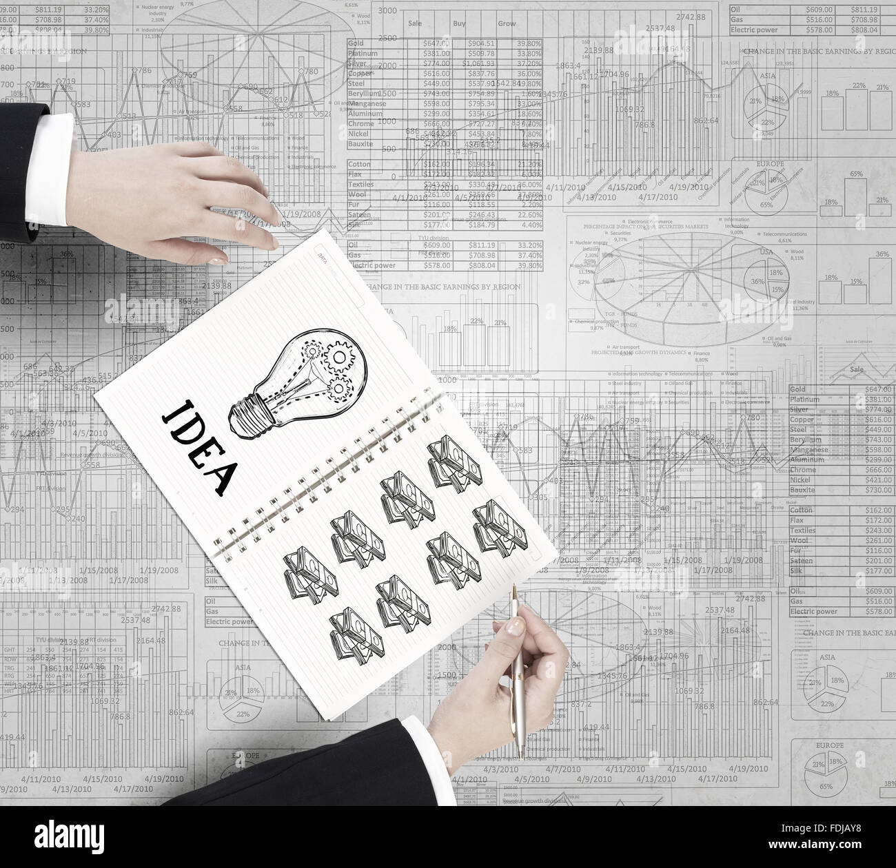 Businessman hands drawing money making formula in notepad Stock Photo ...