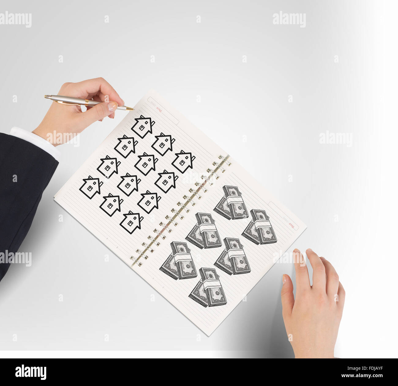 Businessman hands drawing money making formula in notepad Stock Photo ...