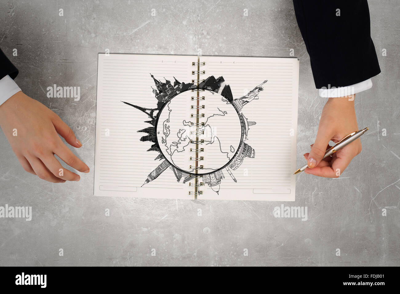 Businessman hands drawing with pen travel concept in notepad hi-res ...