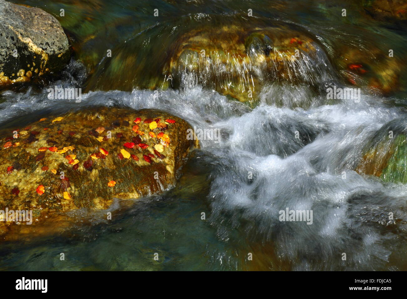 Creek flows past boulders hi-res stock photography and images - Alamy