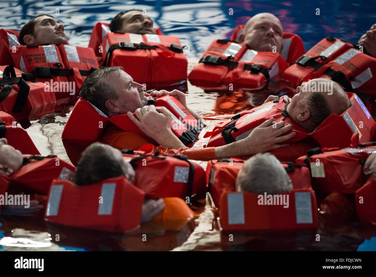 Wearing life jackets hi-res stock photography and images - Alamy