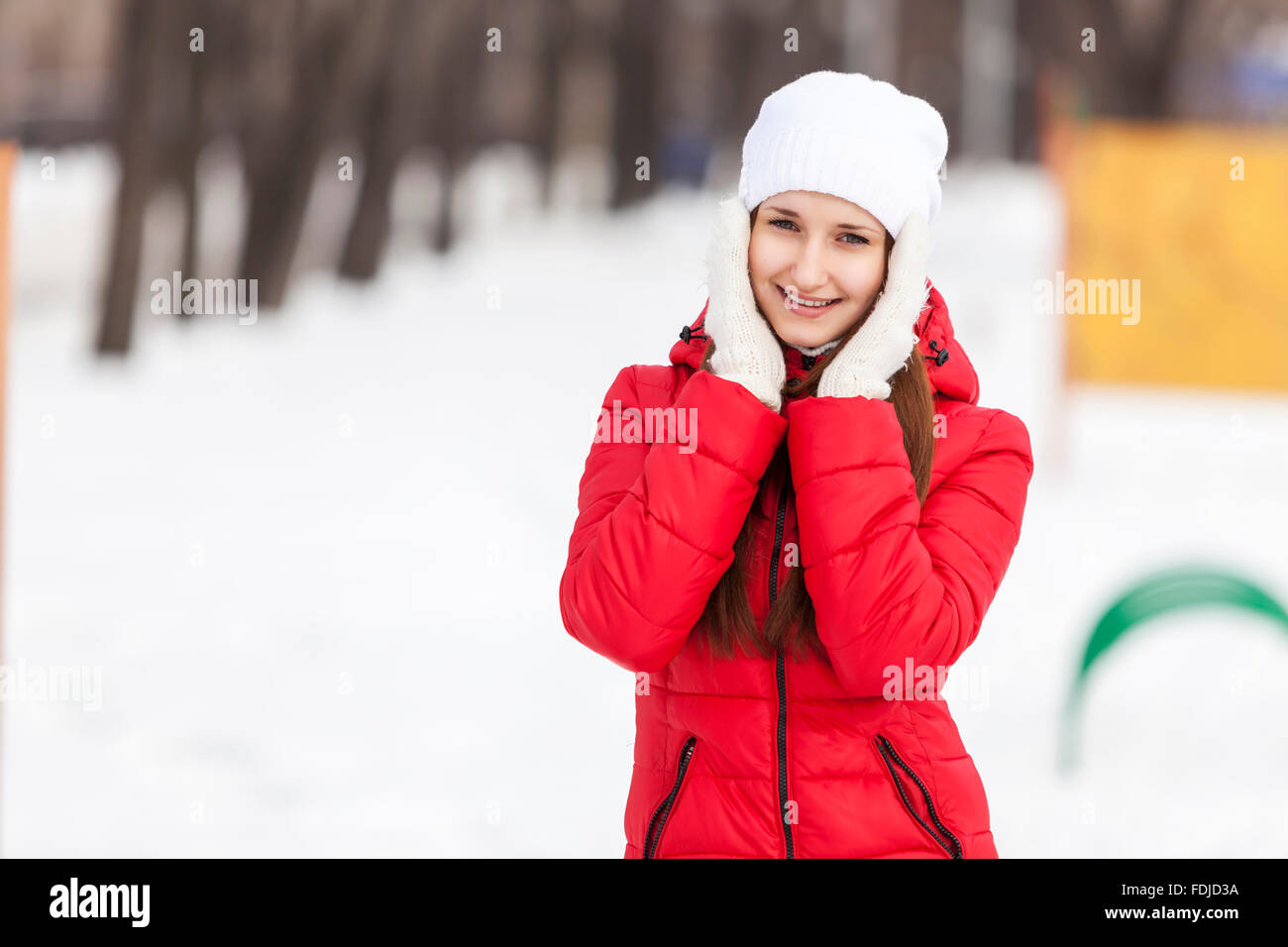 The beautiful smiling woman on walk in winter wood Stock Photo - Alamy