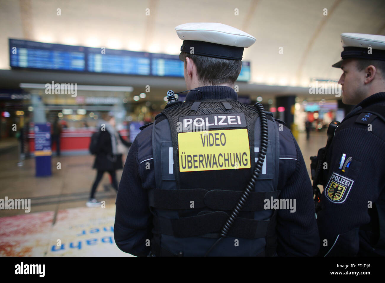 Cologne, Germany. 01st Feb, 2016. Officers of the federal police patrol ...