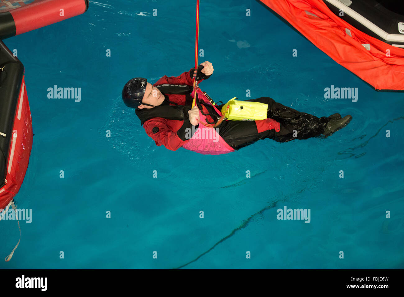 An offshore worker during training for vessel evacuation Stock Photo ...