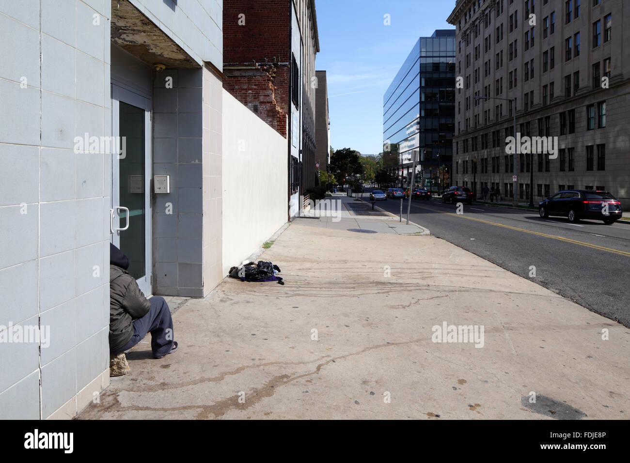 Washington, USA, homeless sits in an entrance in Washington DC Stock ...