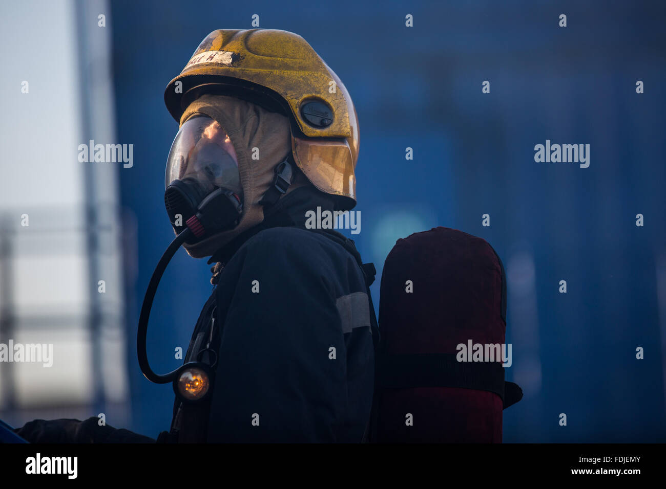 A offshore worker during firefighting training Stock Photo - Alamy