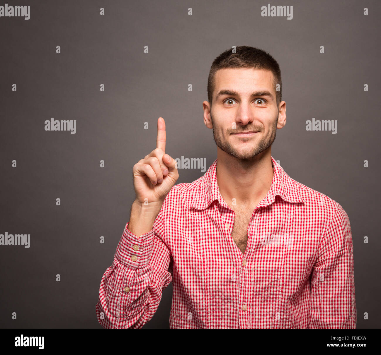 Man pointing up Stock Photo - Alamy
