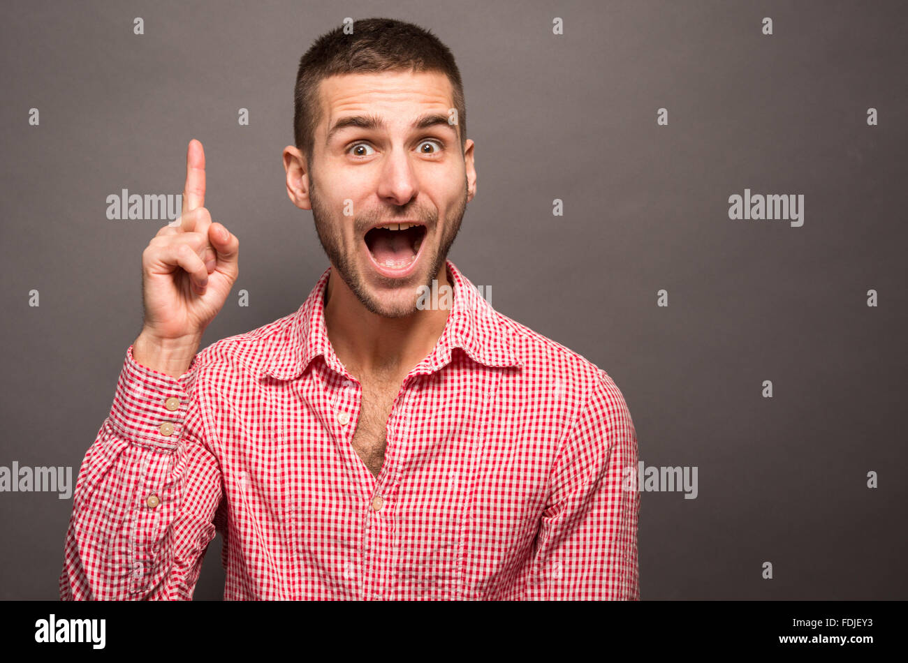 Man pointing up Stock Photo - Alamy
