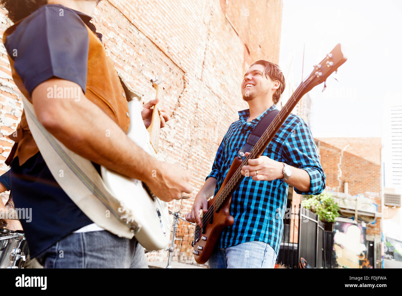 Band of musicians playing in the street Stock Photo - Alamy