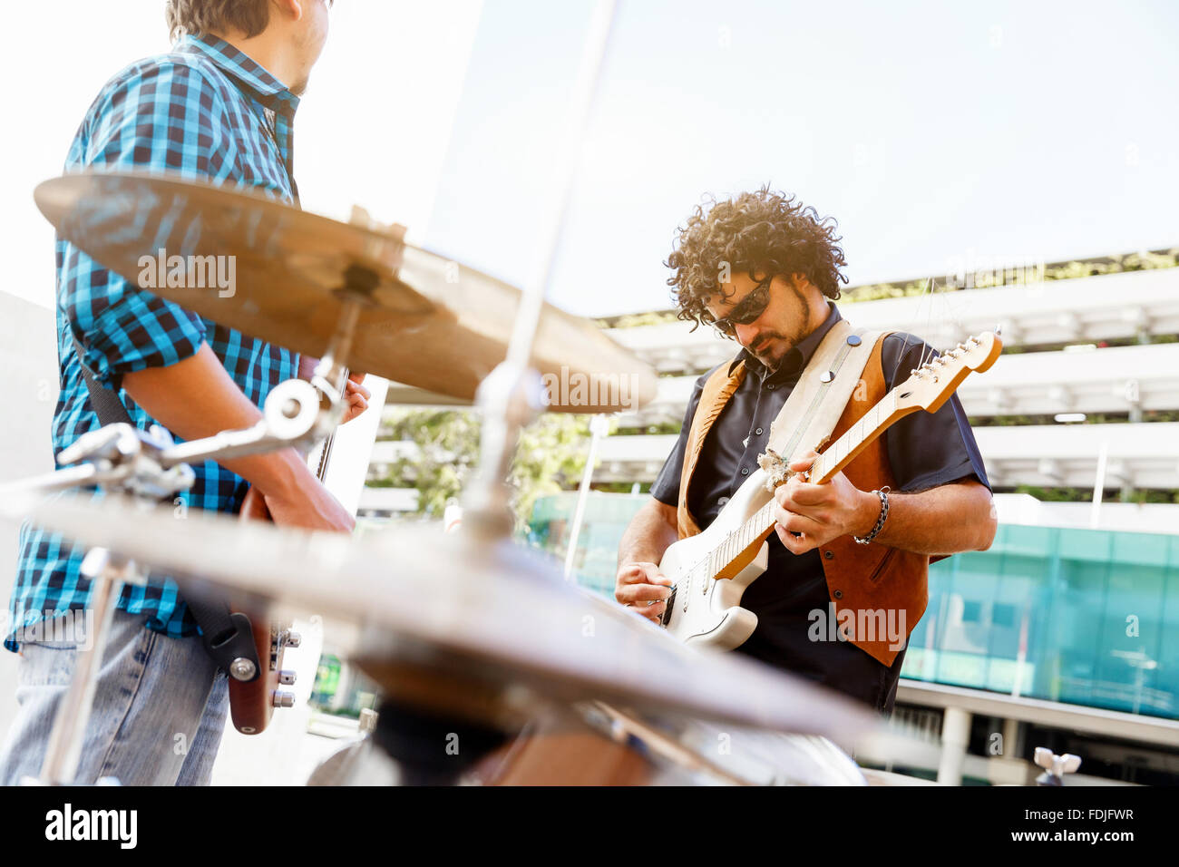 Band of musicians playing in the street Stock Photo - Alamy