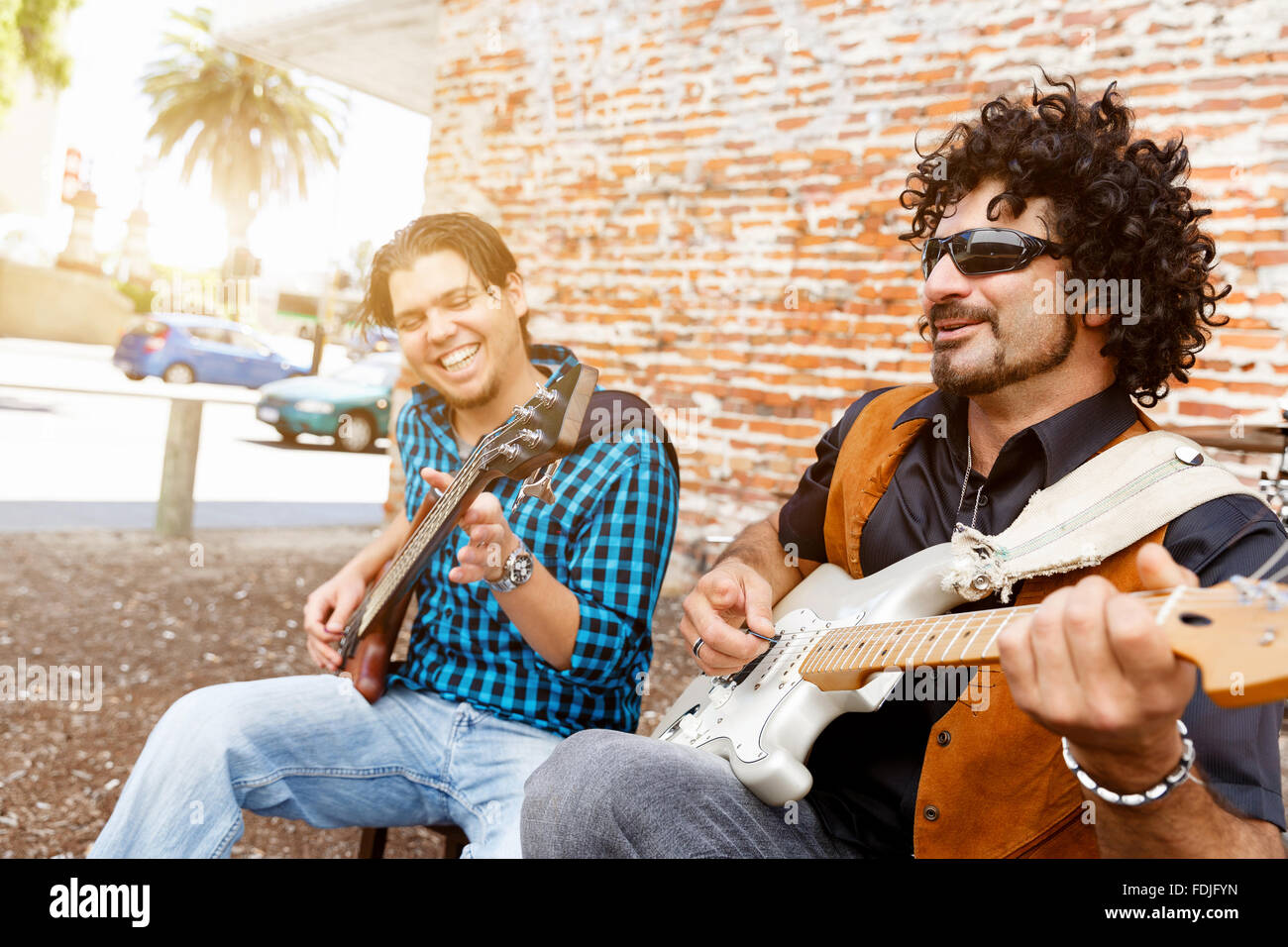 Band of musicians playing in the street Stock Photo - Alamy