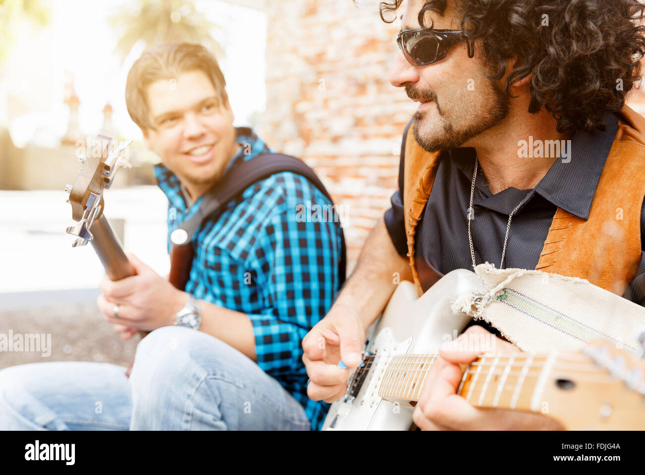 Band of musicians playing in the street Stock Photo - Alamy