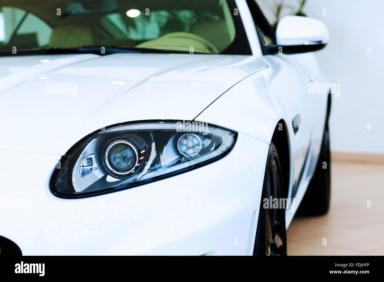 Close up image of car headlight. Front view Stock Photo - Alamy