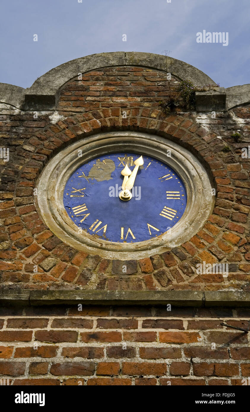 The cusped gable wall and clock brought from Stansty Park, at Erddig ...