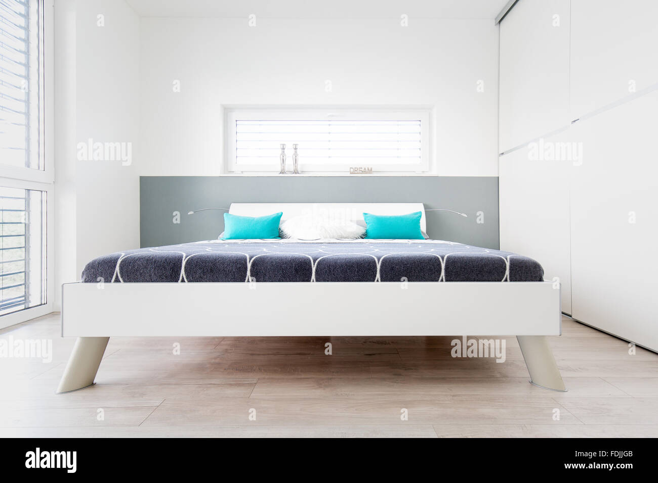 Modern Master Bedroom with large Window and wooden floor Stock Photo ...