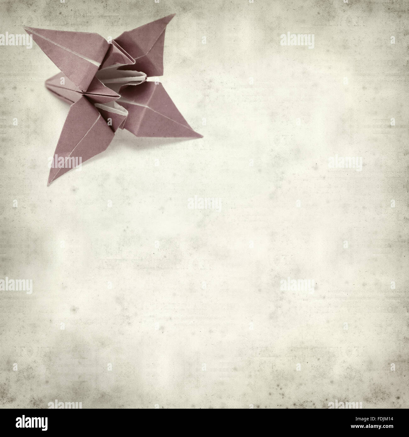 textured old paper background with origami flower Stock Photo - Alamy