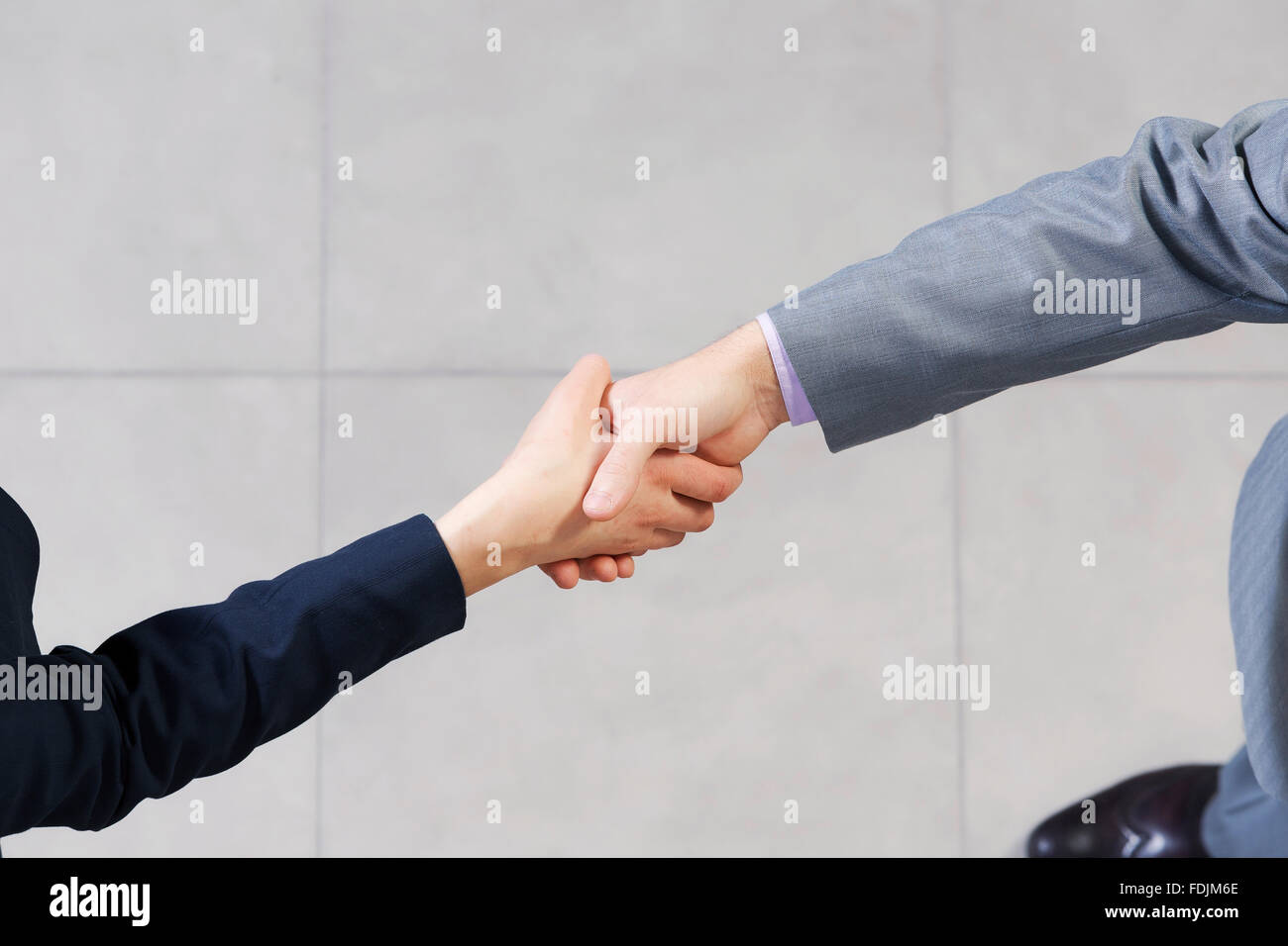 Top view colleagues handshake close hi-res stock photography and images ...