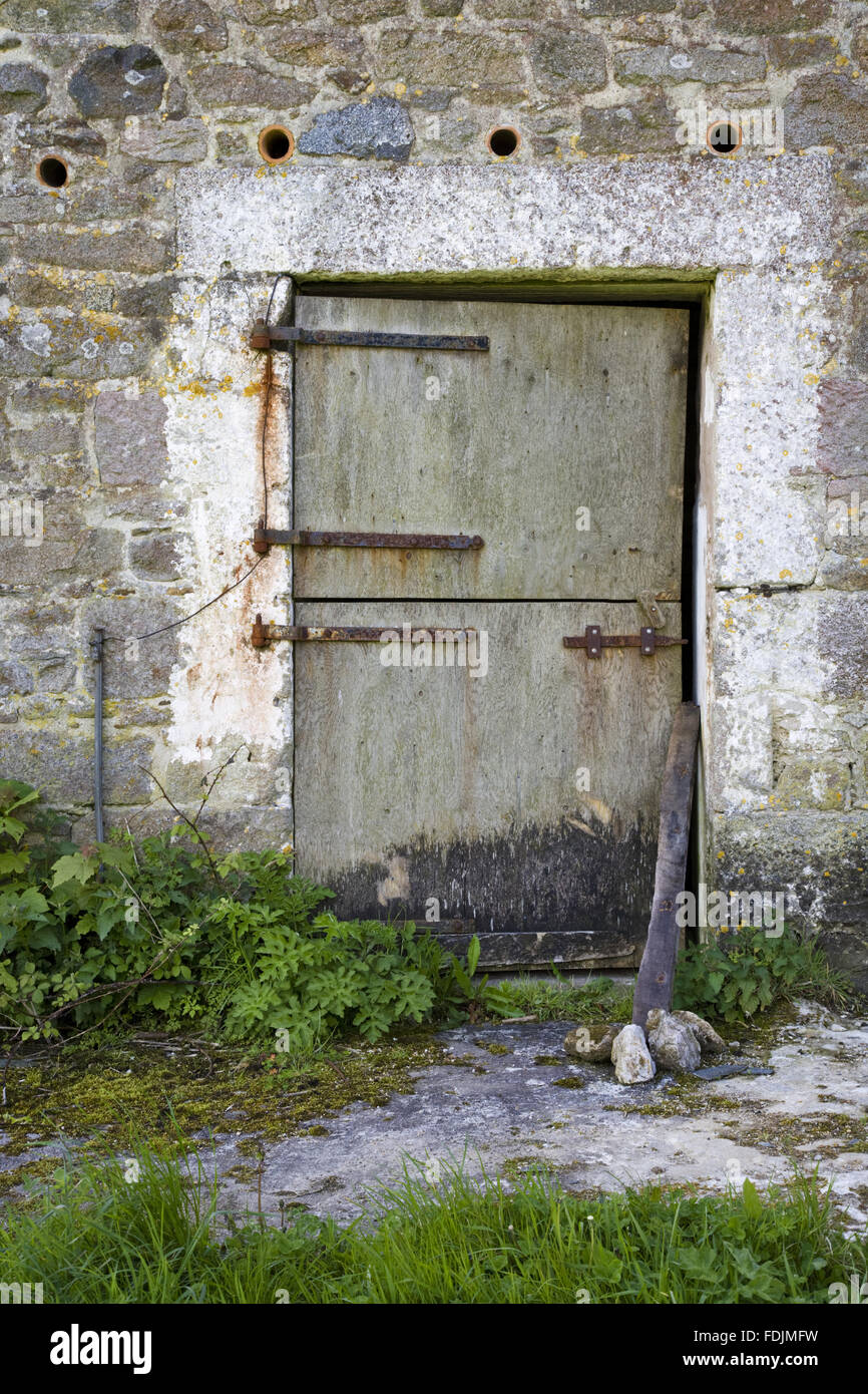 Door on old farm building at Godolphin House, near Helston, Cornwall ...