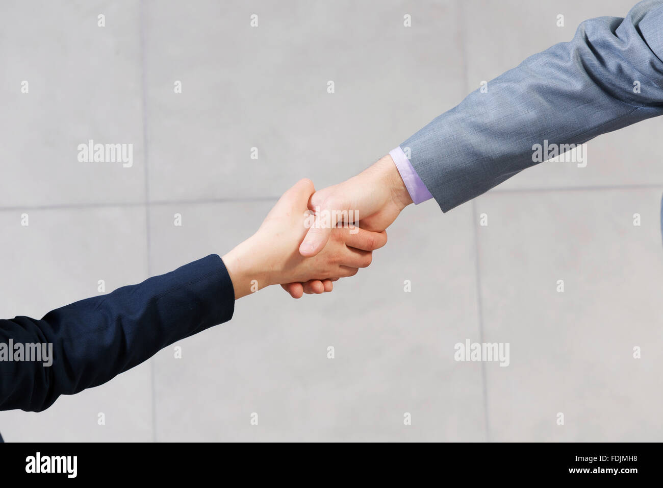Top view colleagues handshake close hi-res stock photography and images ...