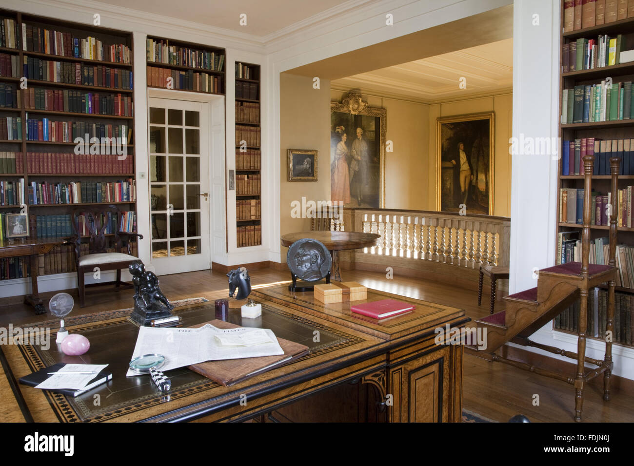 A view over the desk in the Library looking towards the balcony which ...