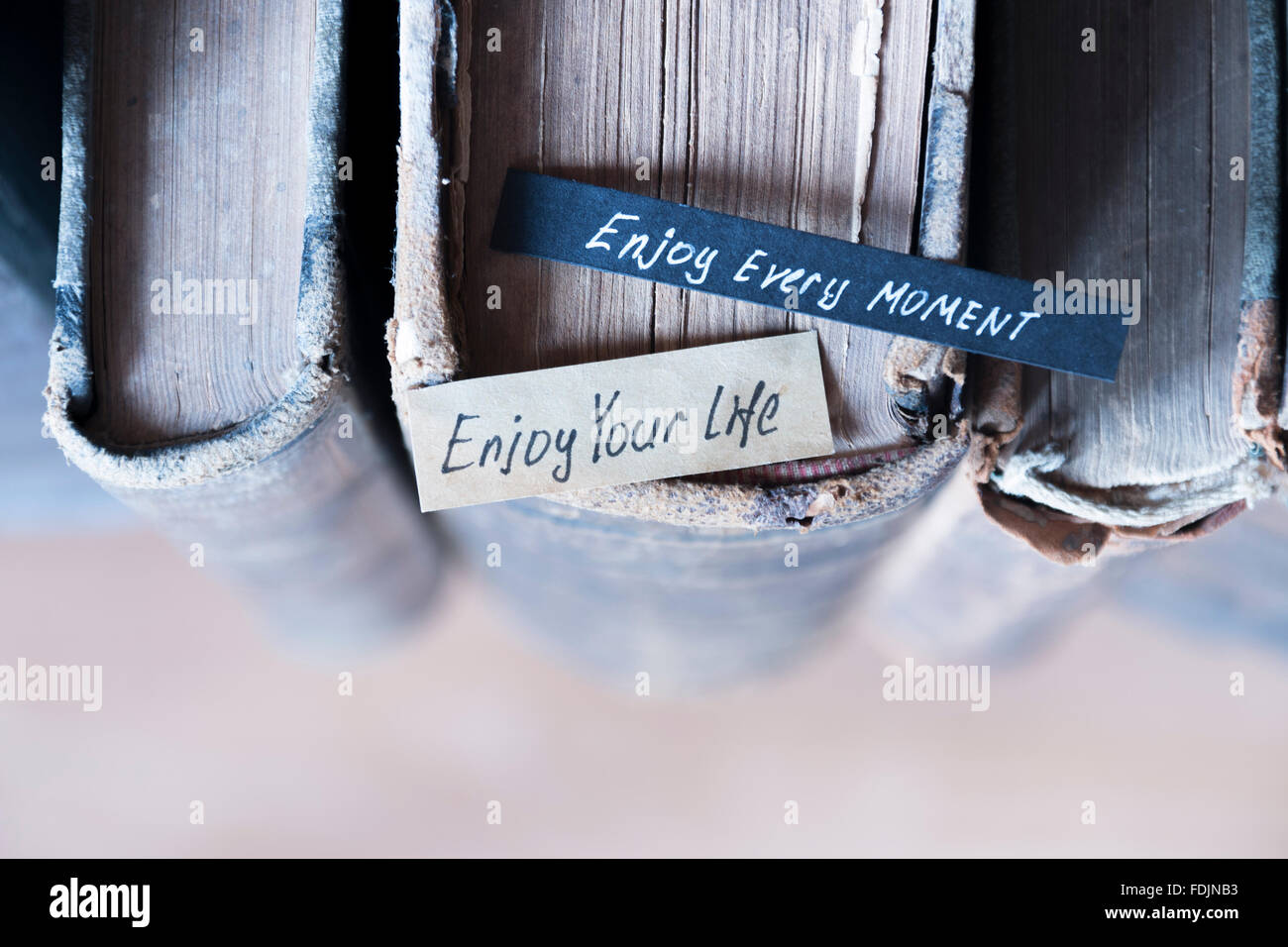 Enjoy every moment and Enjoy your life text Stock Photo - Alamy