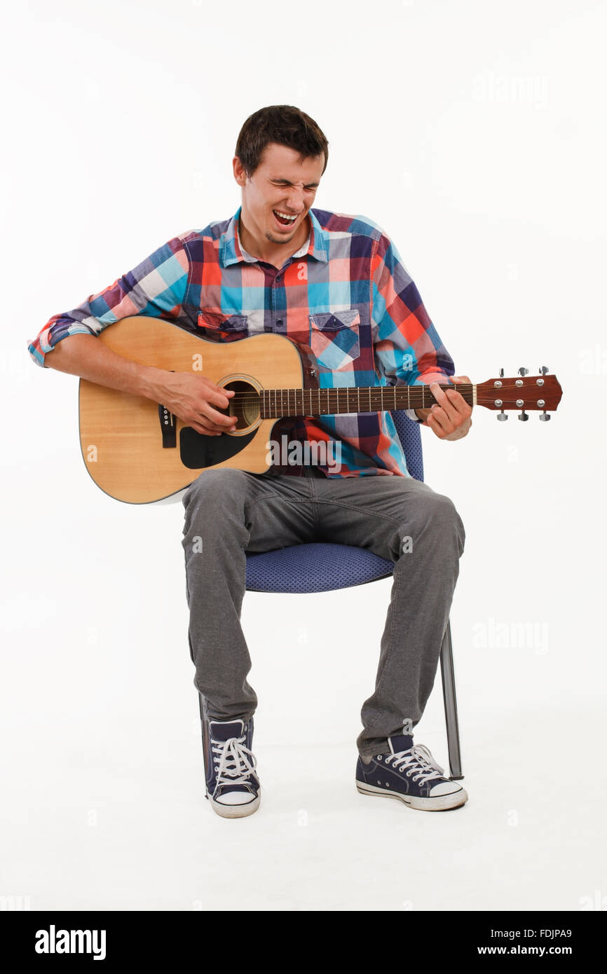 Musician playing his guitar Stock Photo - Alamy