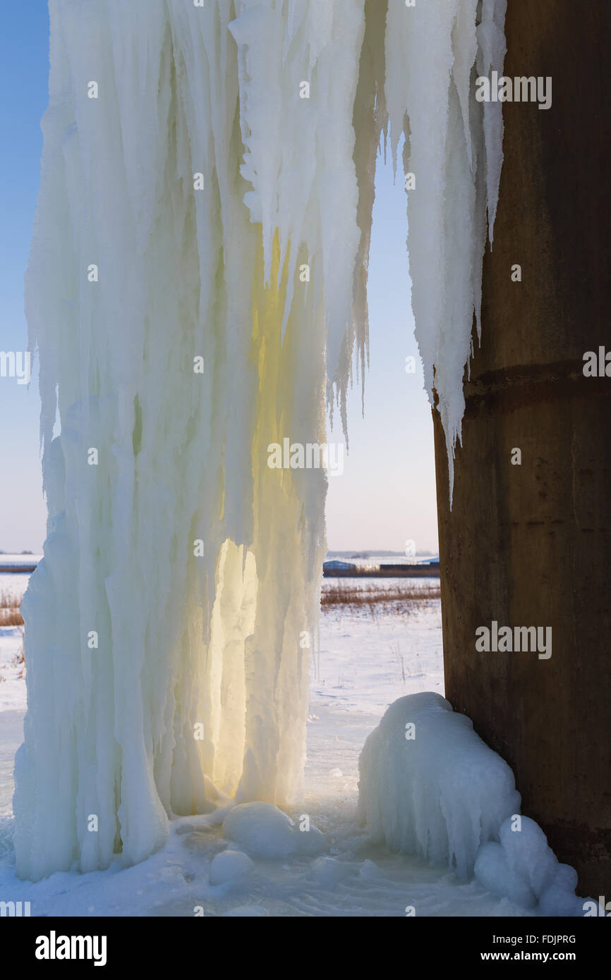 Frozen water from broken water tower in winter Stock Photo - Alamy