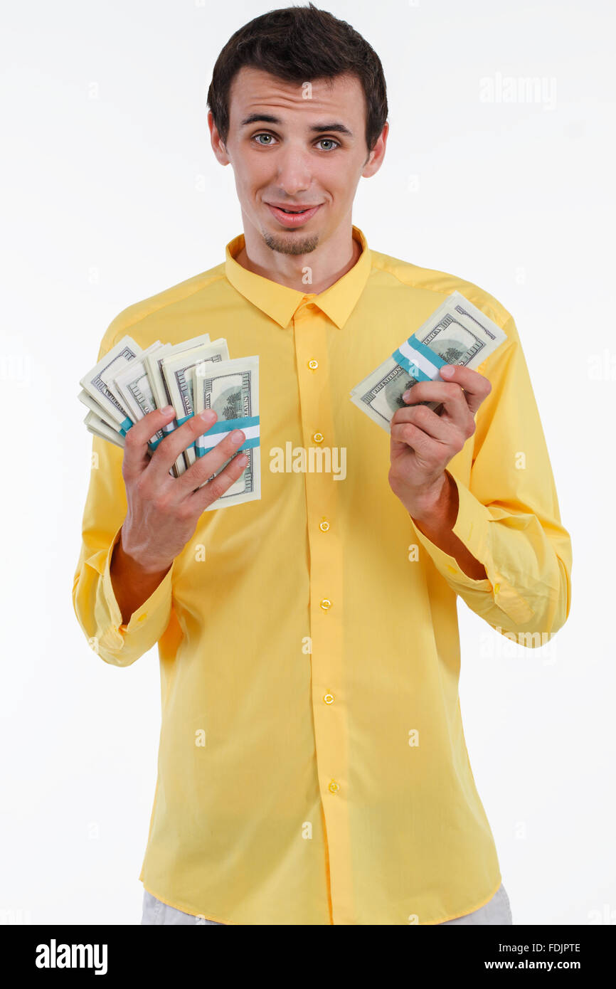 Rich man holding pile of money Stock Photo - Alamy
