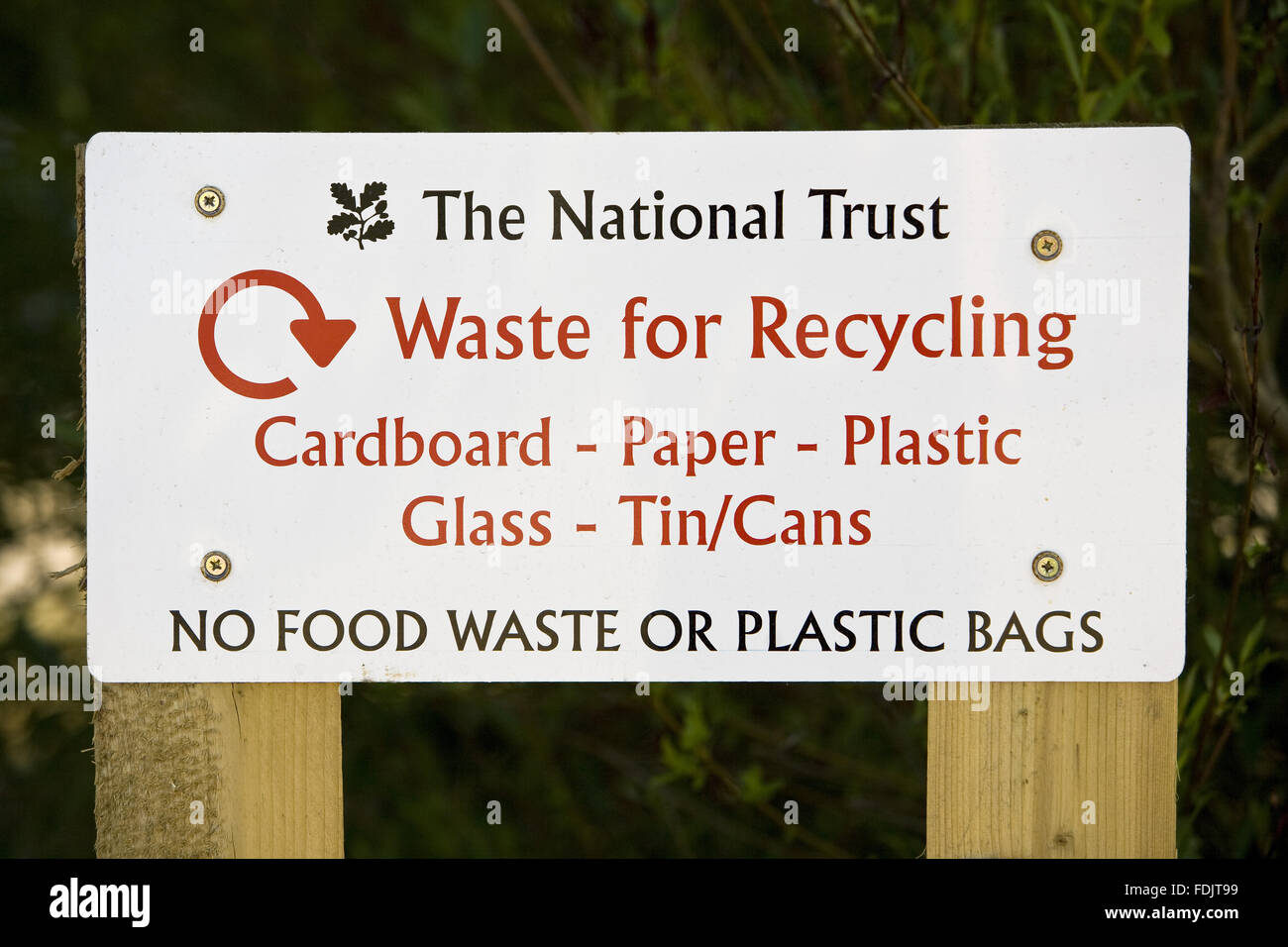 National Trust sign above recycling facilities on the beach at Studland ...