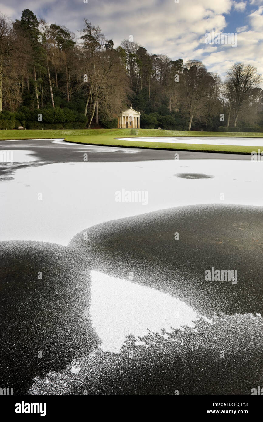 A stunning winter view of the Temple of Piety seen over the frozen Half ...