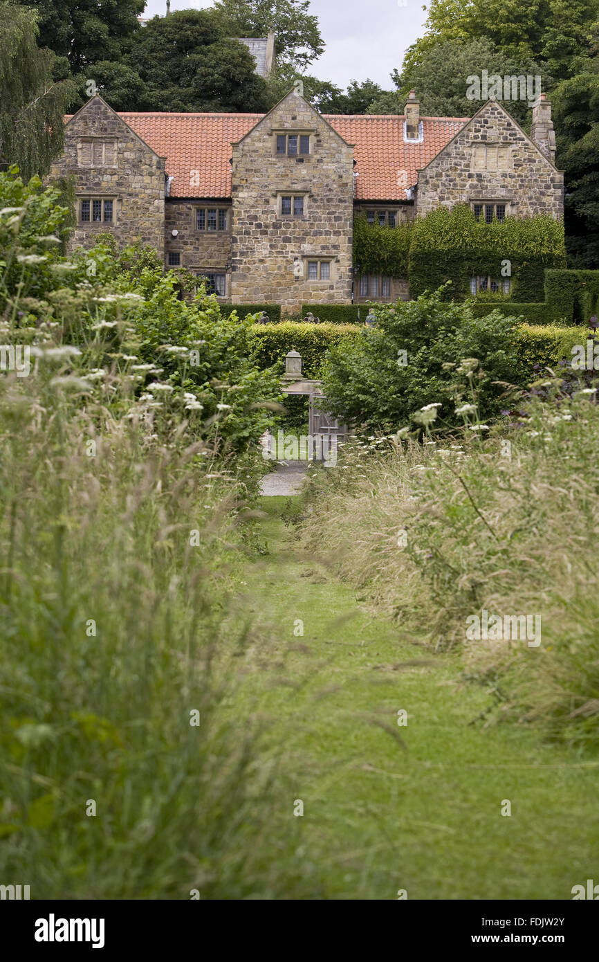 A view through a mown path to the seventeenth-century manor house ...
