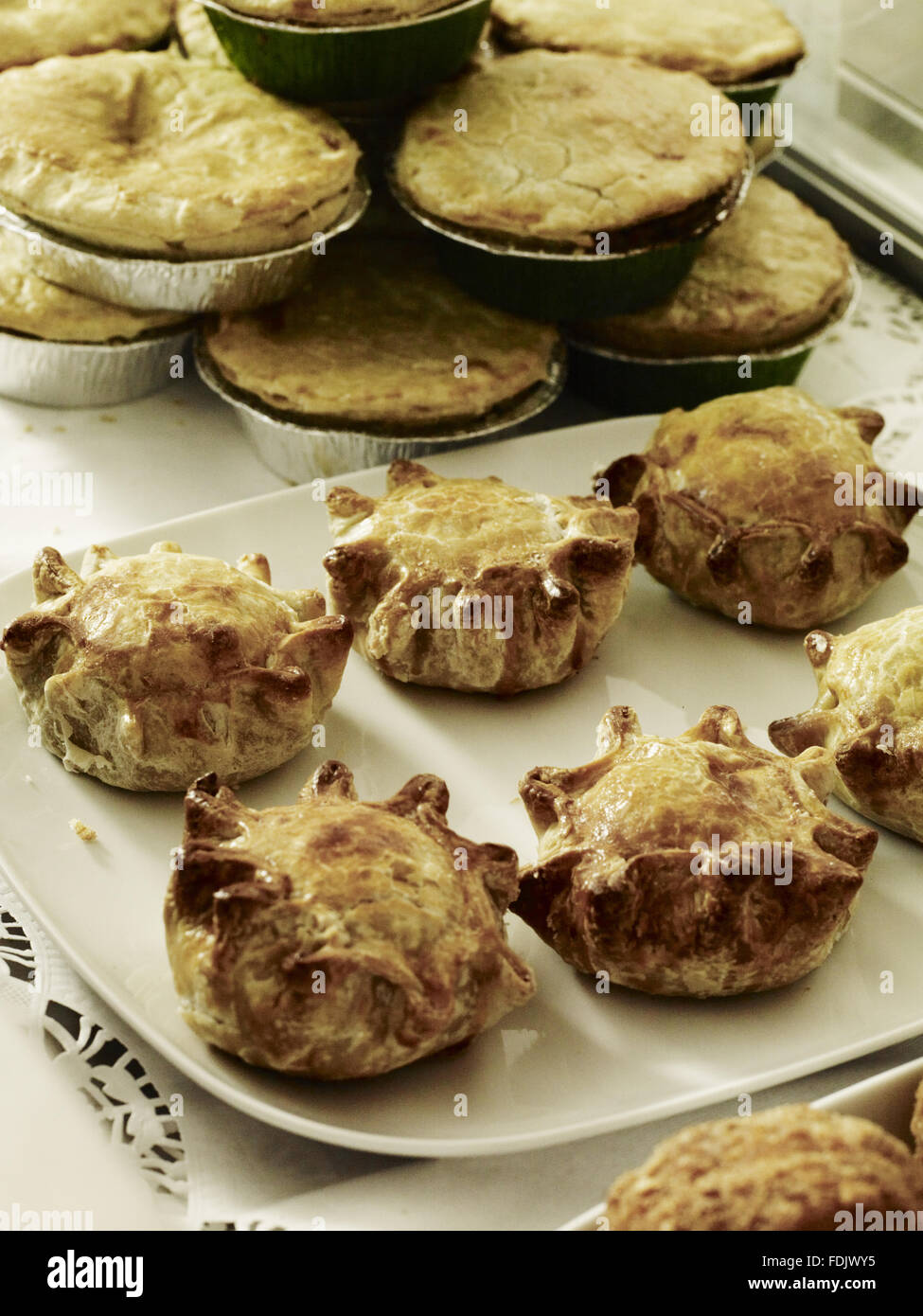 A display of pies for sale at Summerhill Farm Shop and Village Stores ...