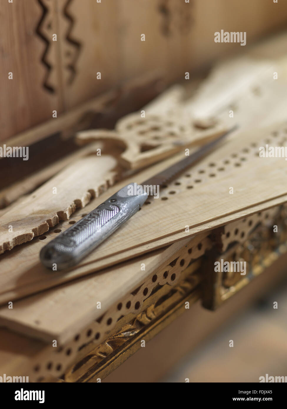 Decorative fretwork and tools in the London home where poet Khadambi ...