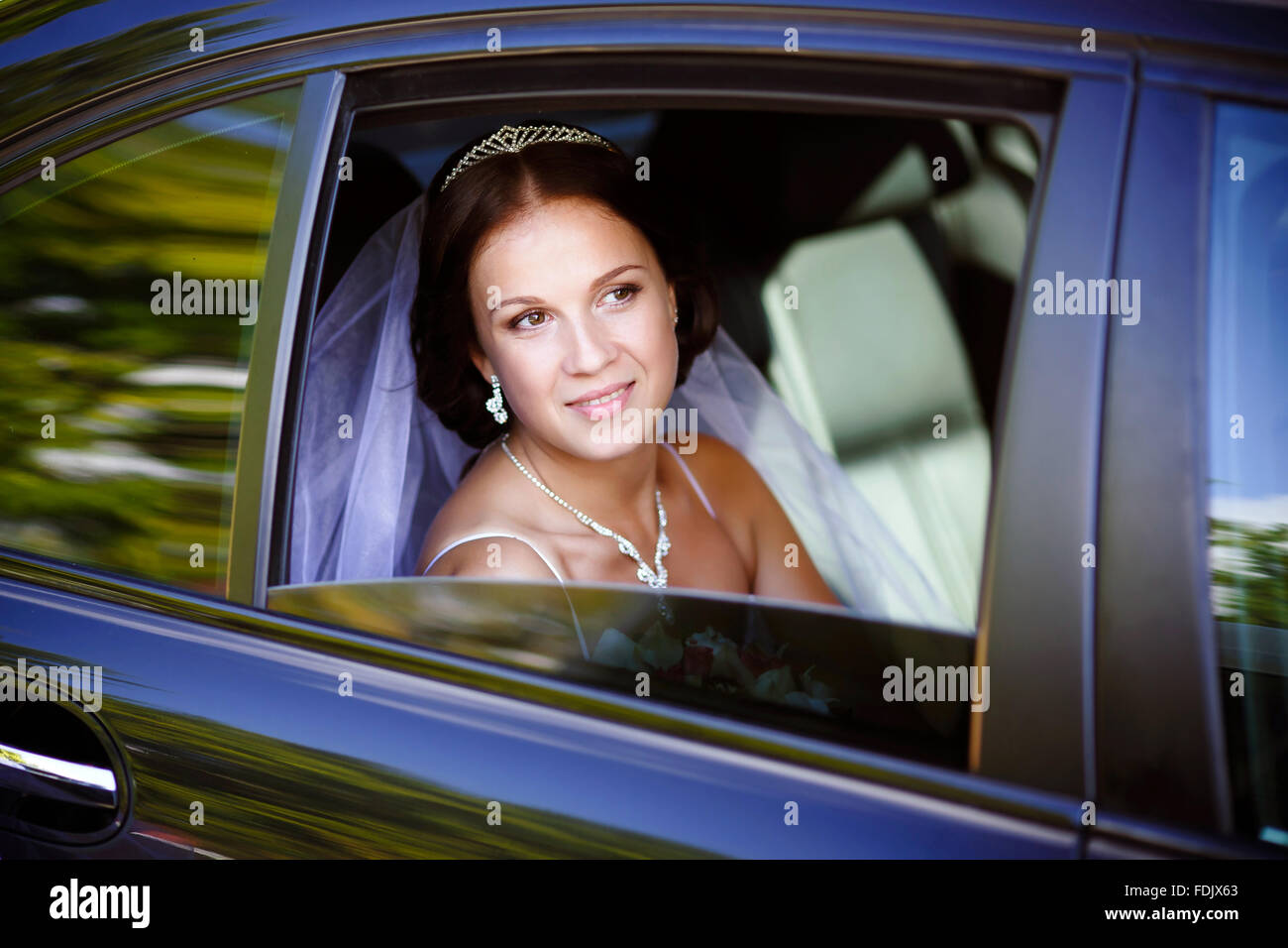 Bride in a car hi-res stock photography and images - Alamy