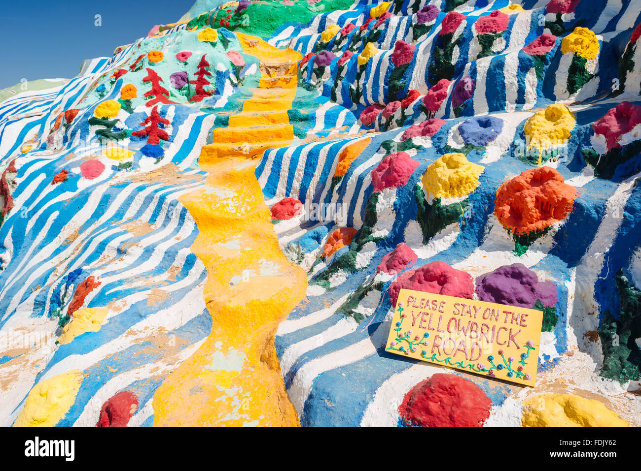 The yellow brick road leading up to the summit of Salvation Mountain ...