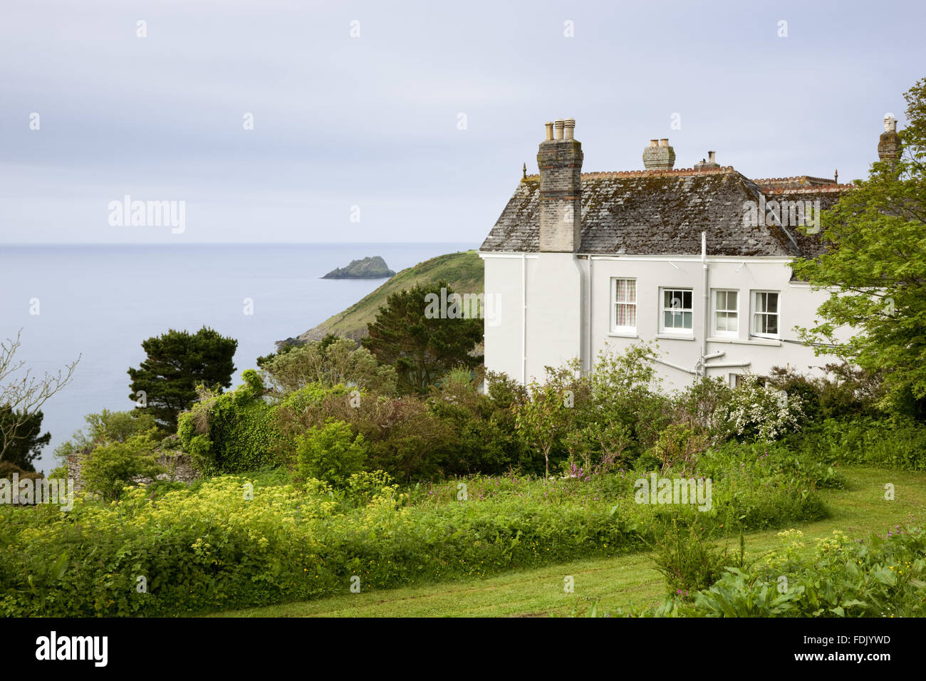 Broom Parc perched on the clifftop at Veryan, near Truro, Cornwall, a ...