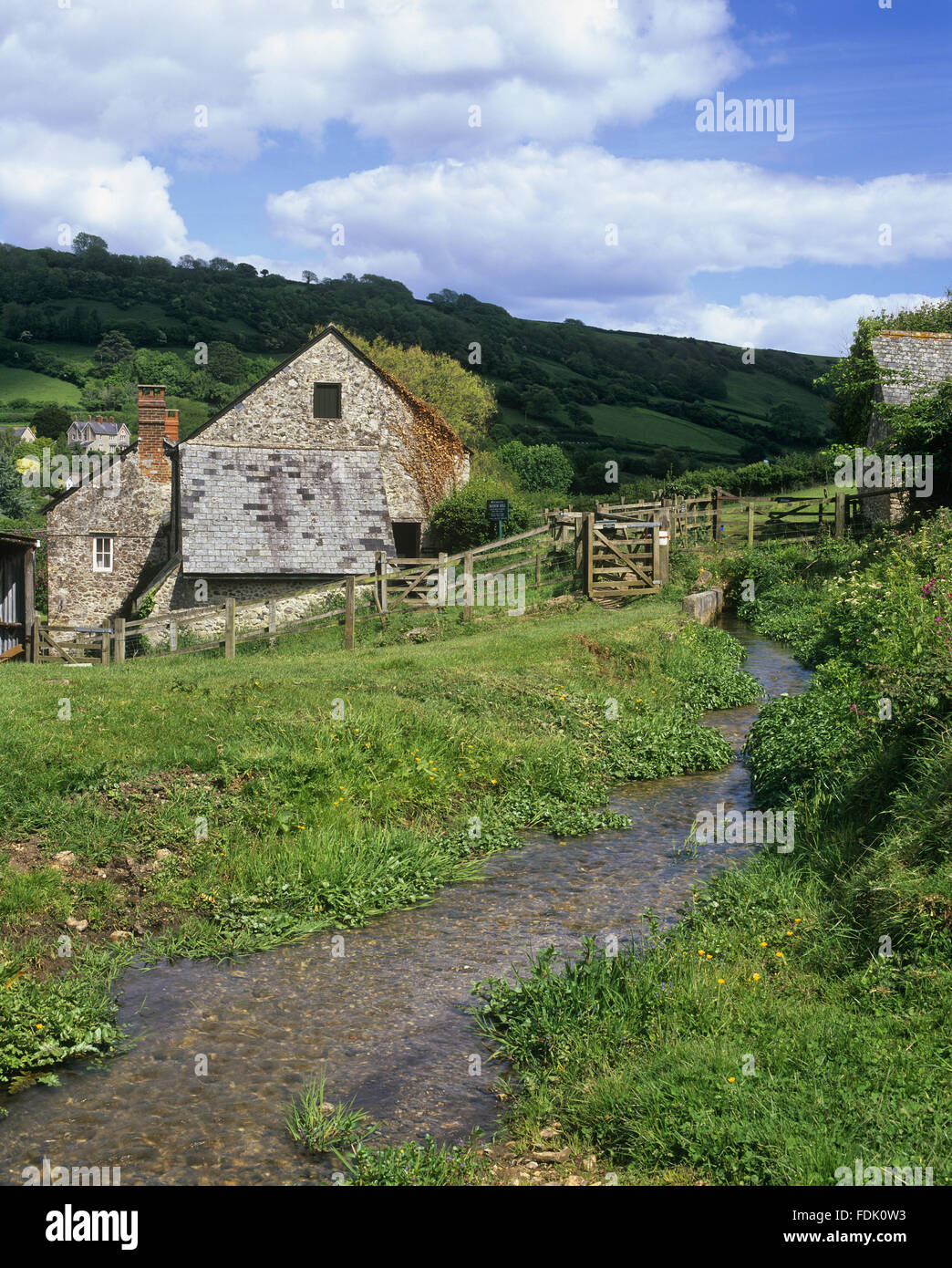 Water-powered Manor Mill at Branscombe, Devon. The Mill is restored to ...
