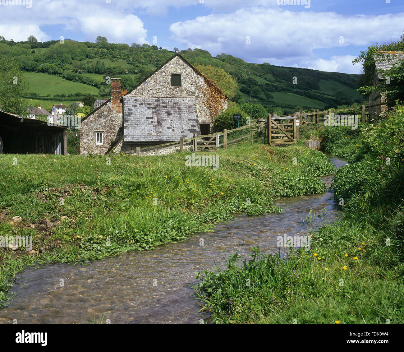Water-powered Manor Mill at Branscombe, Devon. The Mill is restored to ...