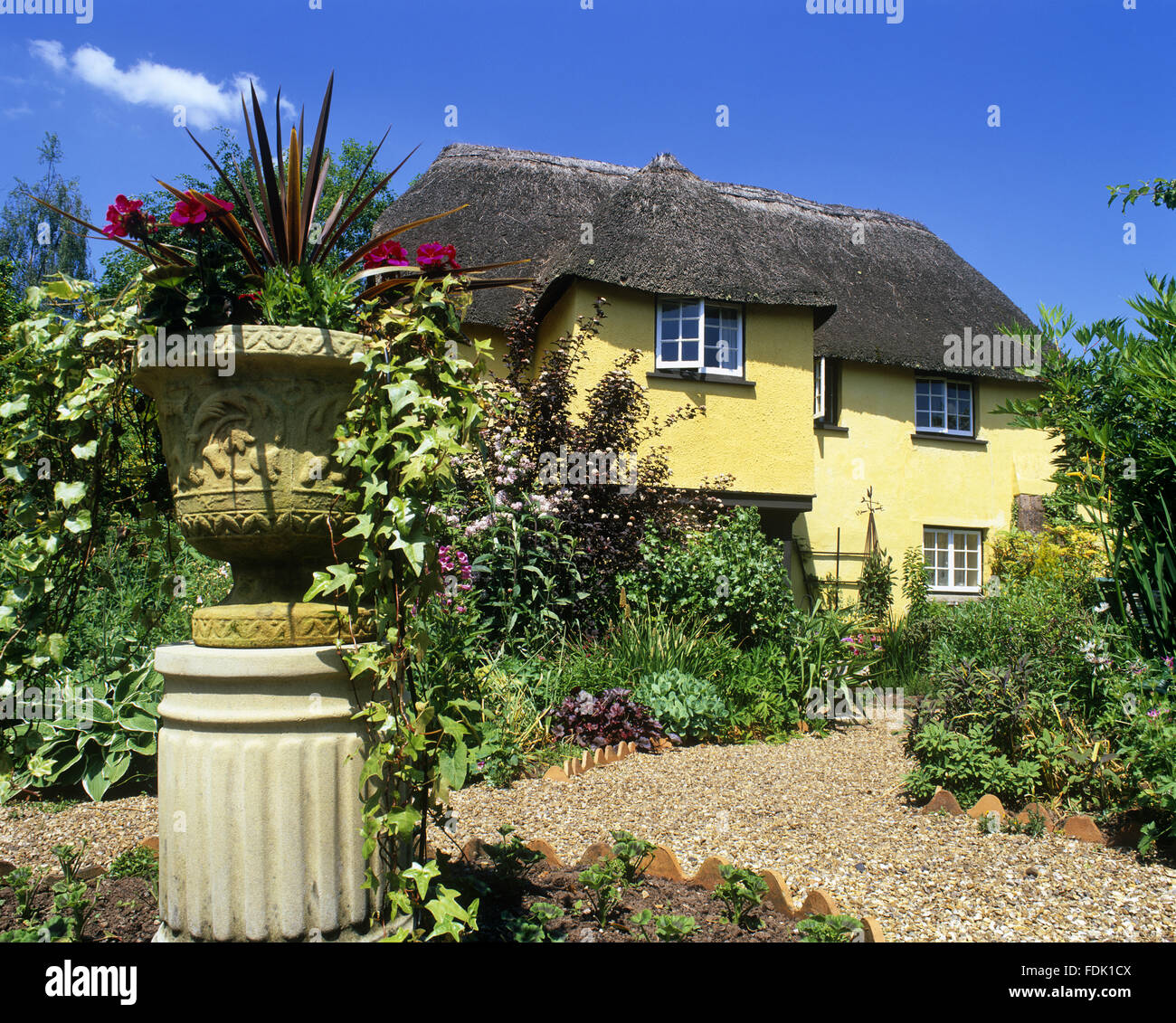 Budlake Post Office housed in a small thatched cottage served the ...