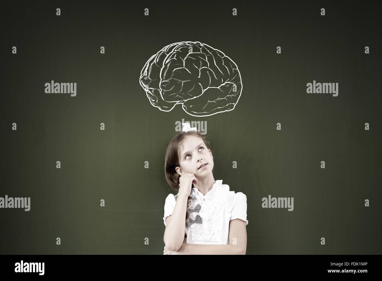 Kid student girl against school blackboard having good idea Stock Photo ...