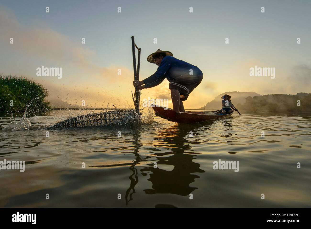 Two men in fishing boat hi-res stock photography and images - Alamy