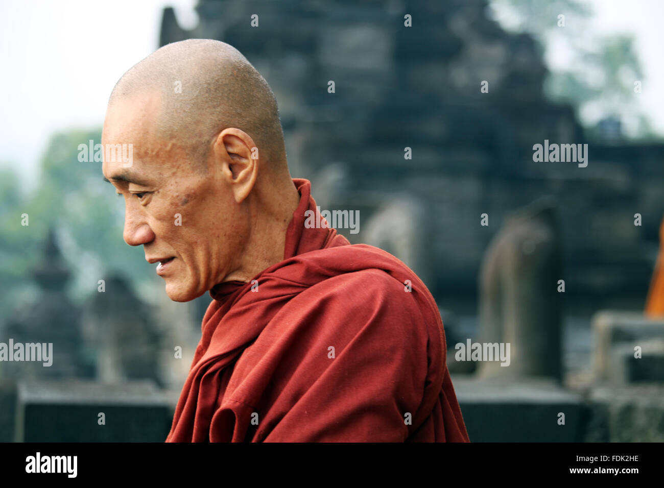 Portrait of a buddhist monk in Borobudur Buddhist temple Stock Photo ...