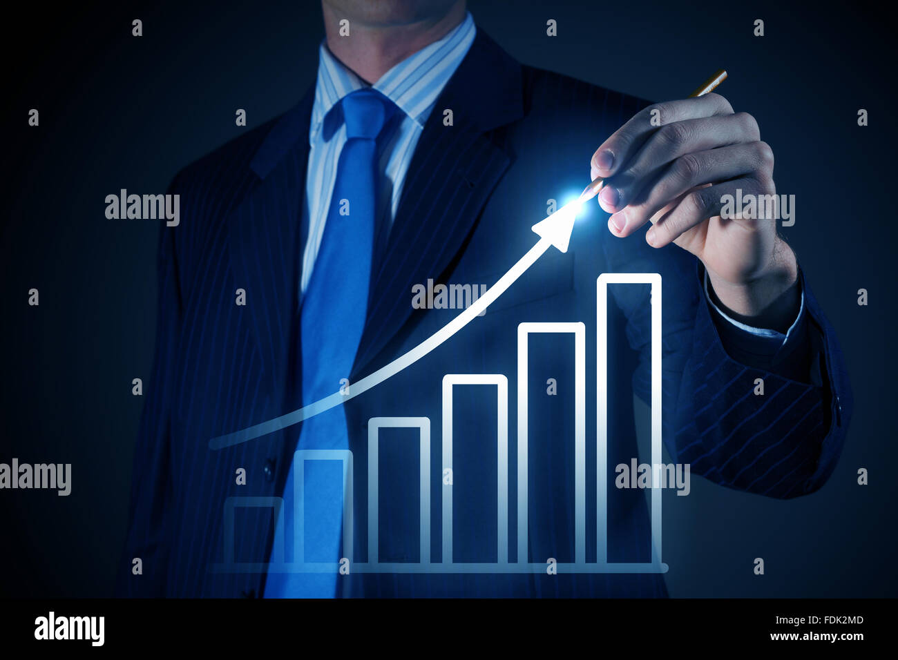 Chest view of businessman drawing with pencil increasing graph Stock ...