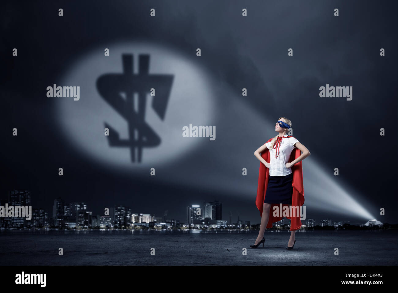 Young woman super hero and dollar sign in spotlight Stock Photo - Alamy