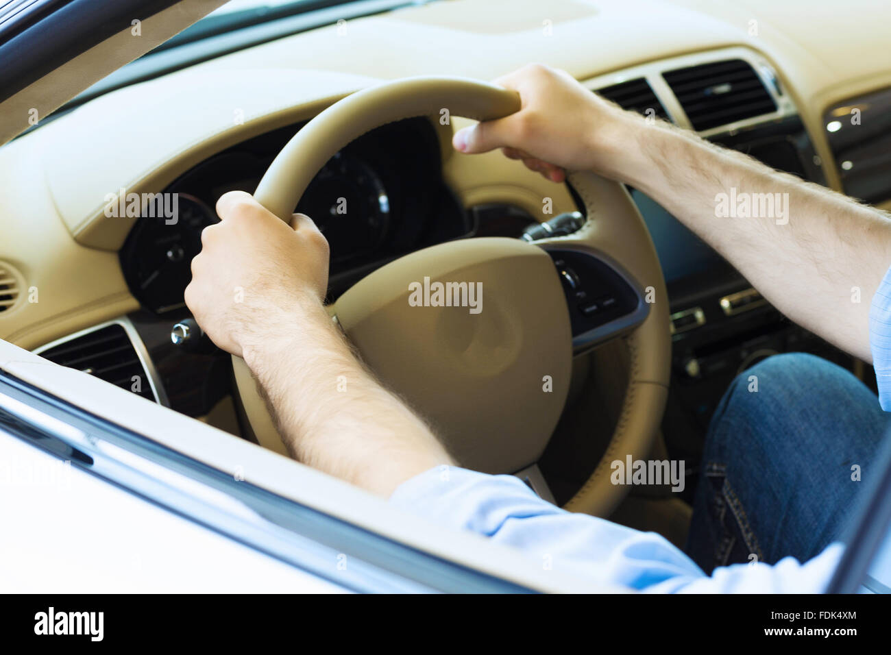 Mans hands steering wheel driving hi-res stock photography and images ...